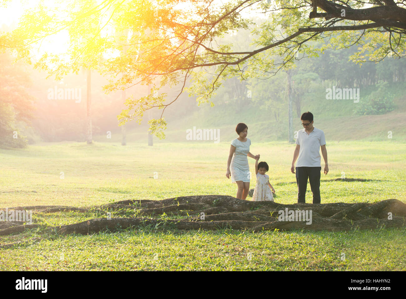 Happy Asian Family enjoying family time together in the park Stock ...