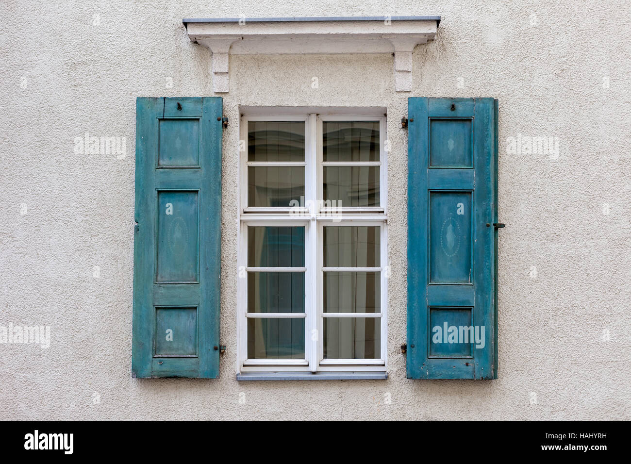 Blue frame and brown shutters hi-res stock photography and images - Alamy