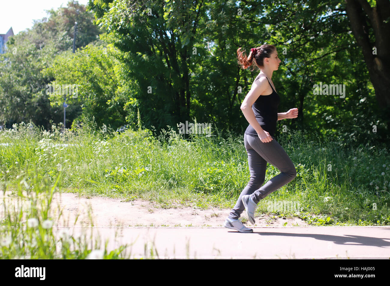 woman sport run in park outdoor Stock Photo - Alamy