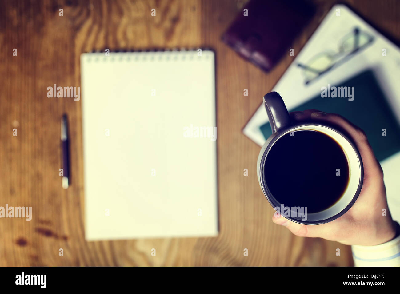 toned table write hand top view Stock Photo - Alamy