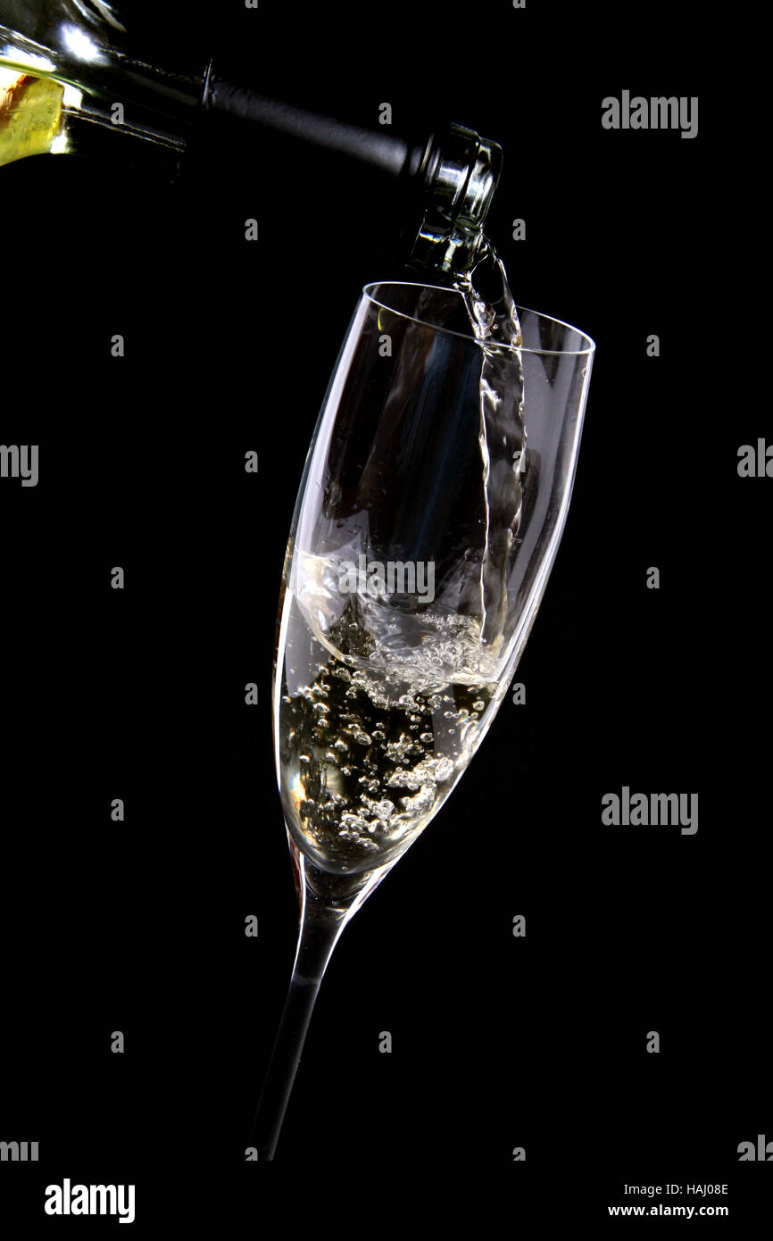 Wine being poured into a glass Stock Photo - Alamy