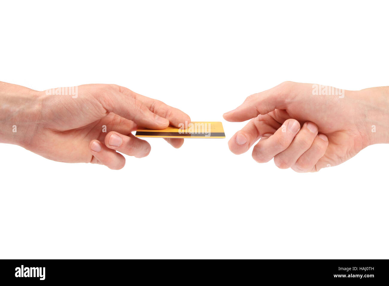 Hand gives credit card to another hand Stock Photo - Alamy