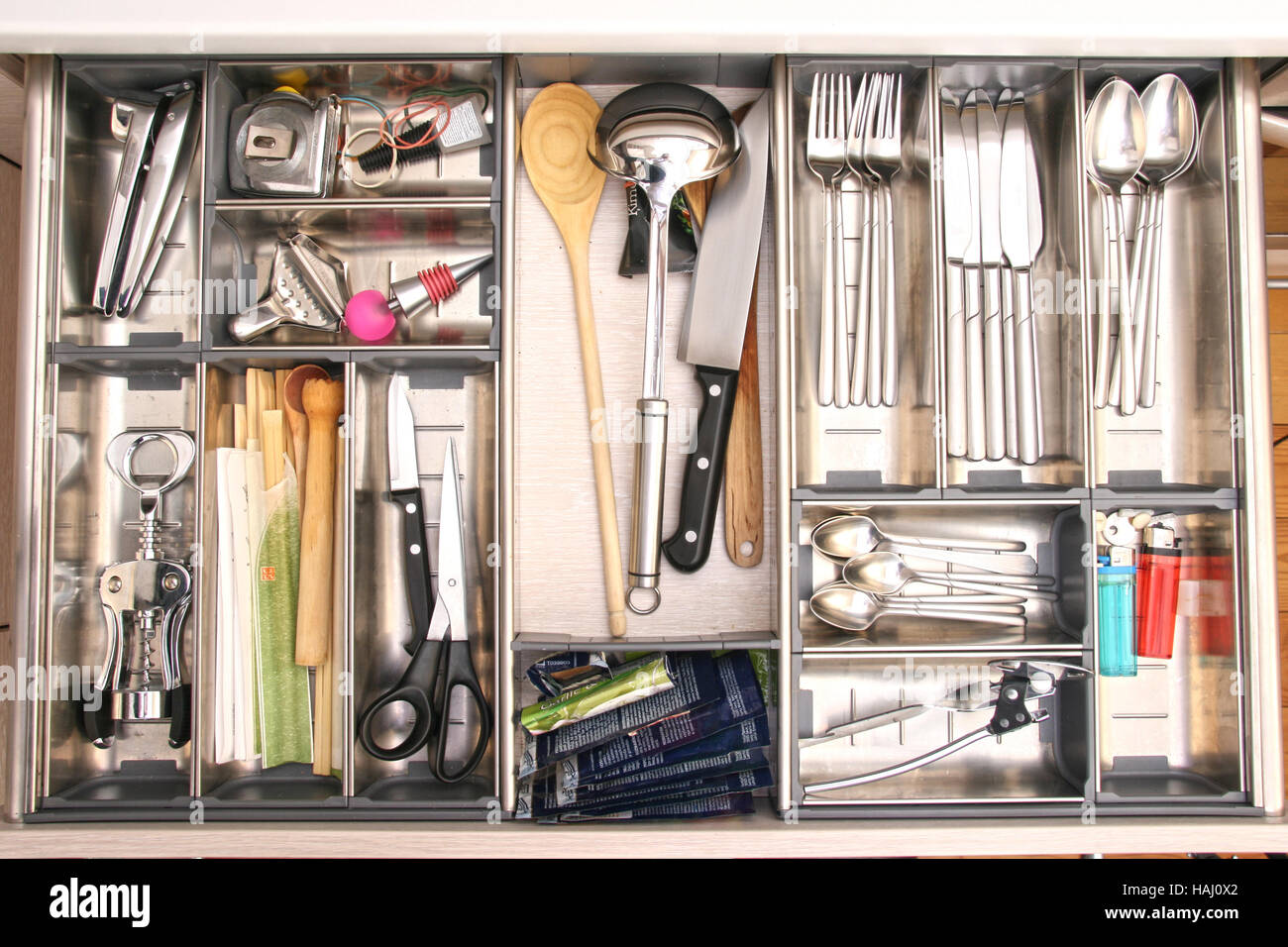 Kitchen utensils drawer Stock Photo - Alamy