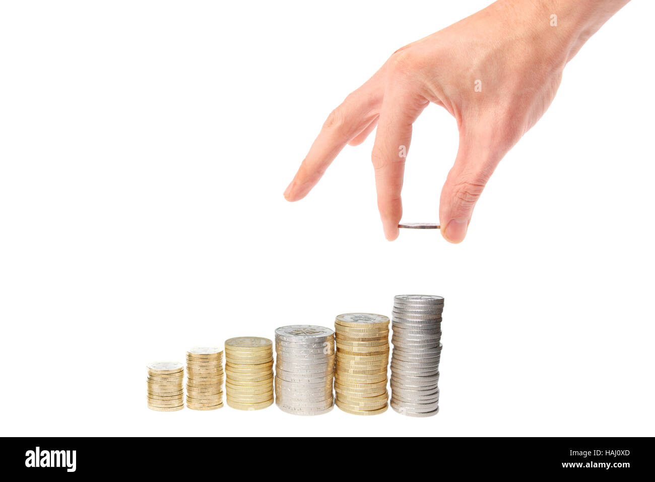 Hand put coin to money staircase Stock Photo - Alamy