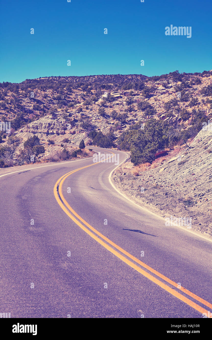 Vintage toned scenic curved road, travel concept background, Colorado ...
