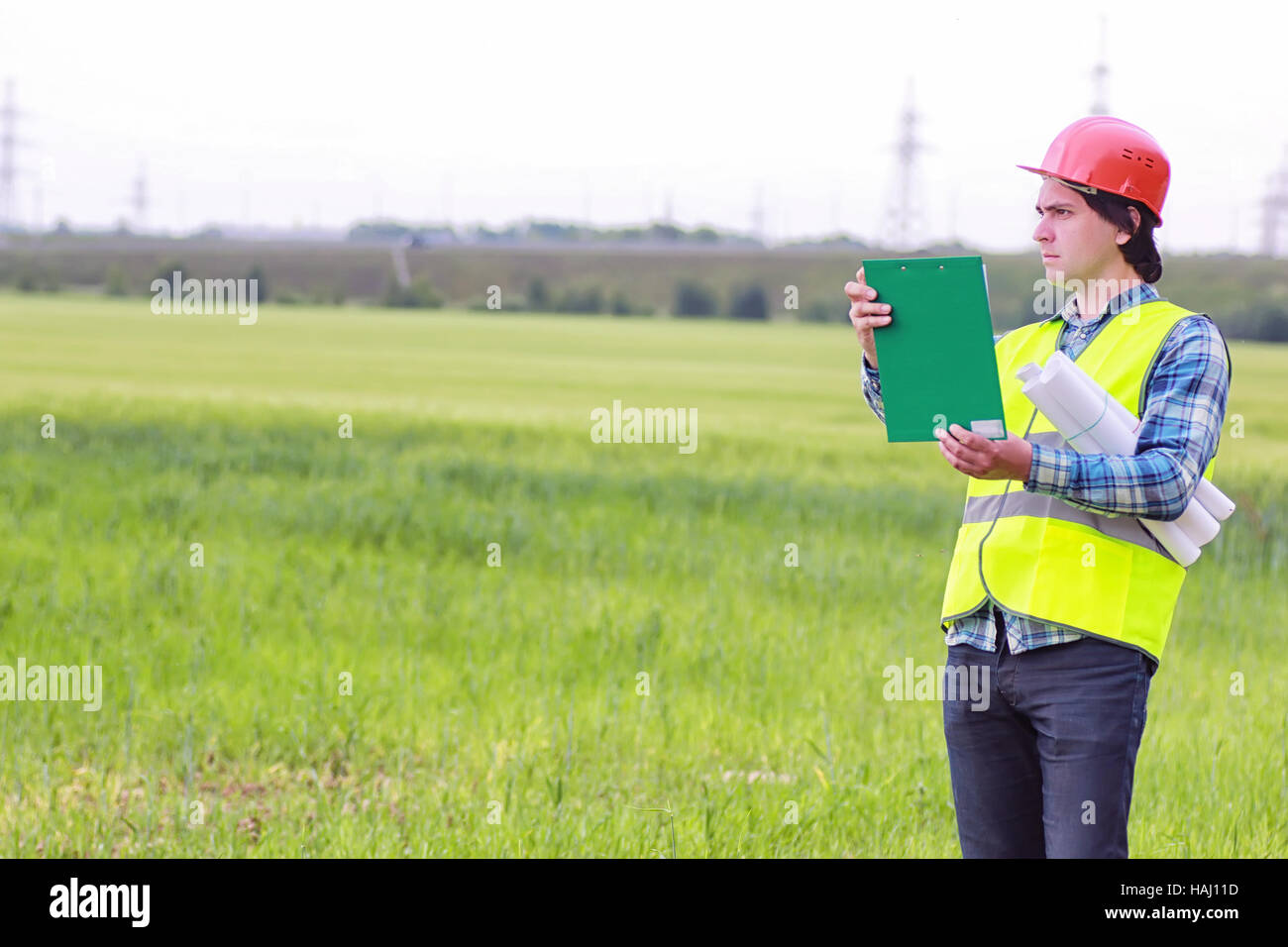 construction two man in the field Stock Photo - Alamy