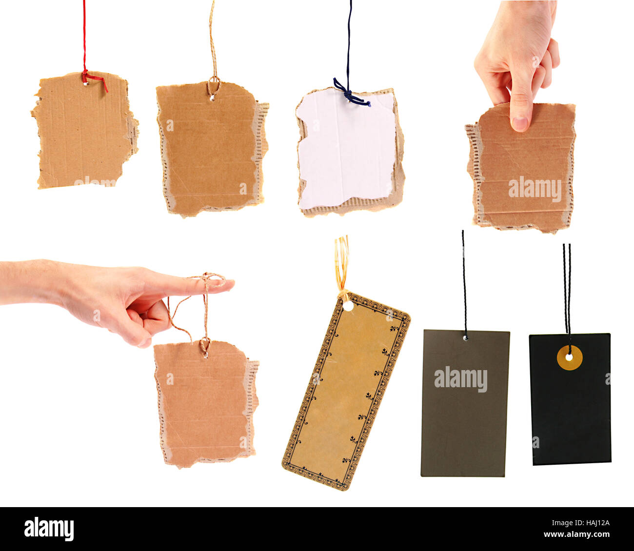 set of blank cardboard tags hanging on white background Stock Photo - Alamy