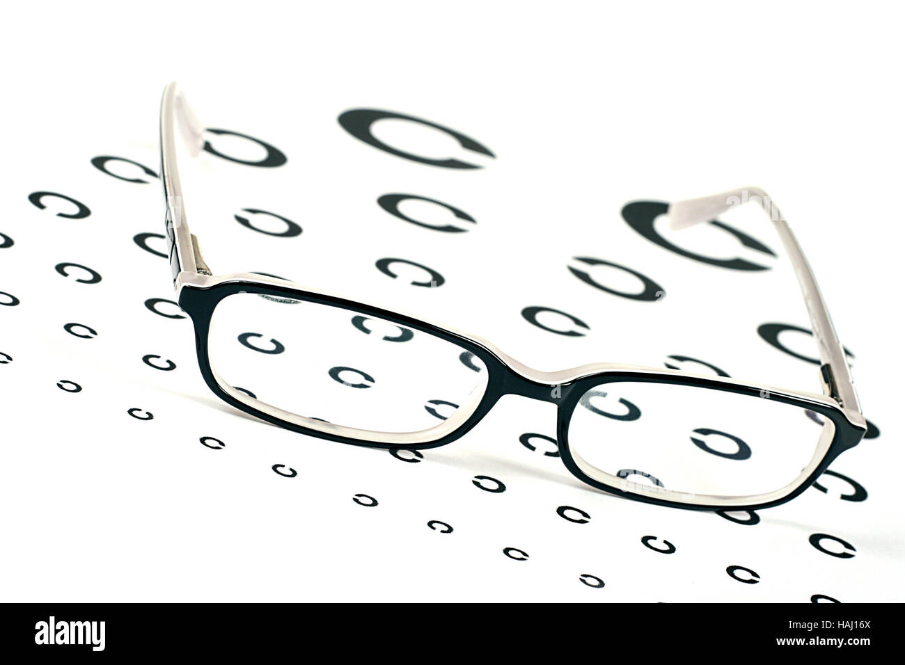 Black Glasses On A Eye Sight Test Chart Stock Photo Alamy