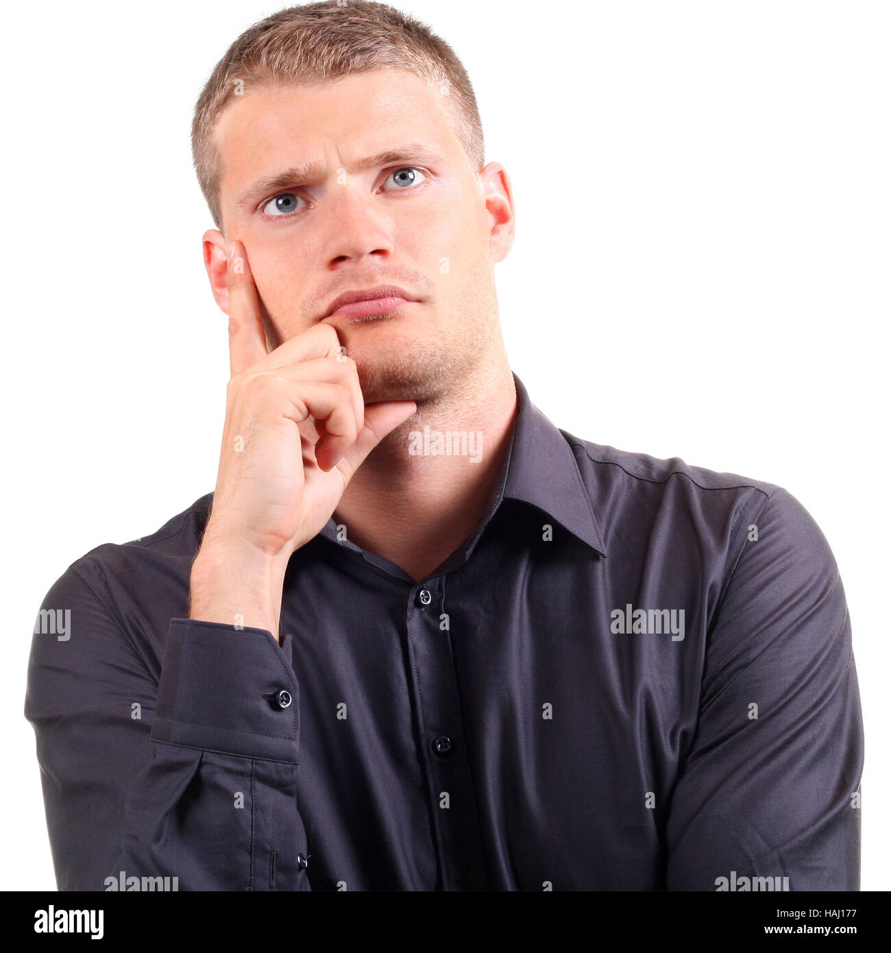 portrait of young man thinking Stock Photo - Alamy