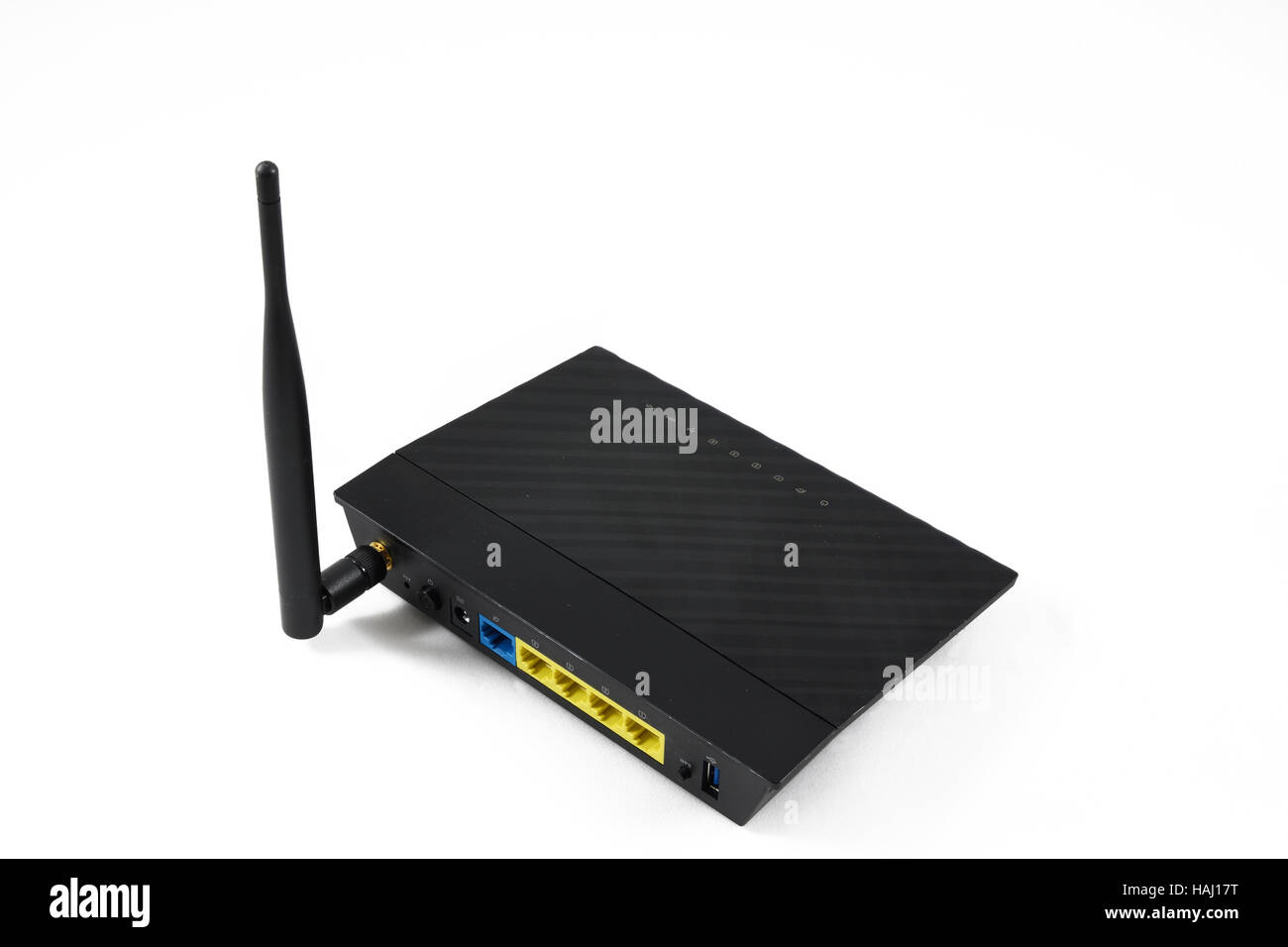 Common black wireless router isolated on white Stock Photo - Alamy