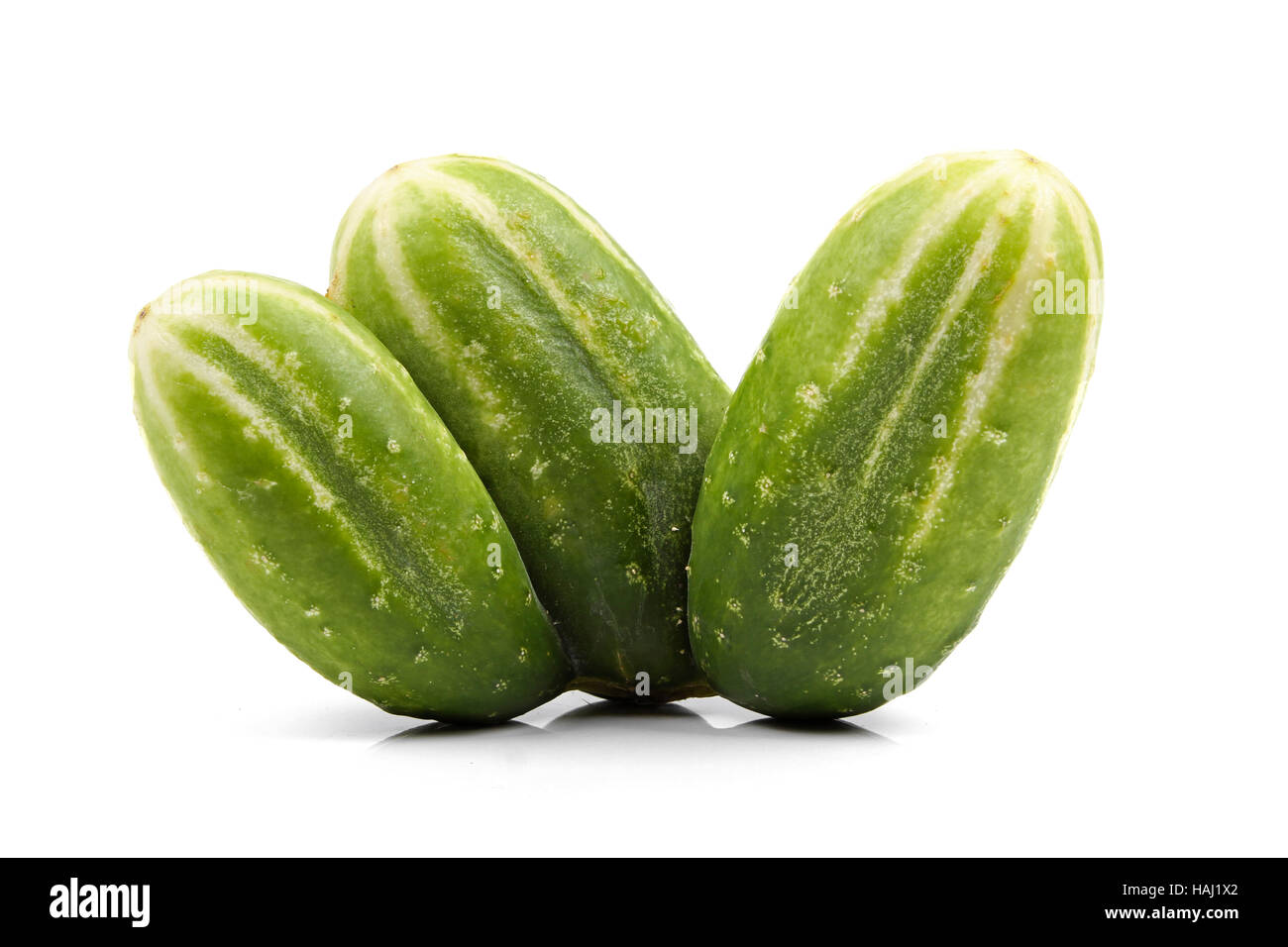 three cucumber mutant isolated on white Stock Photo - Alamy