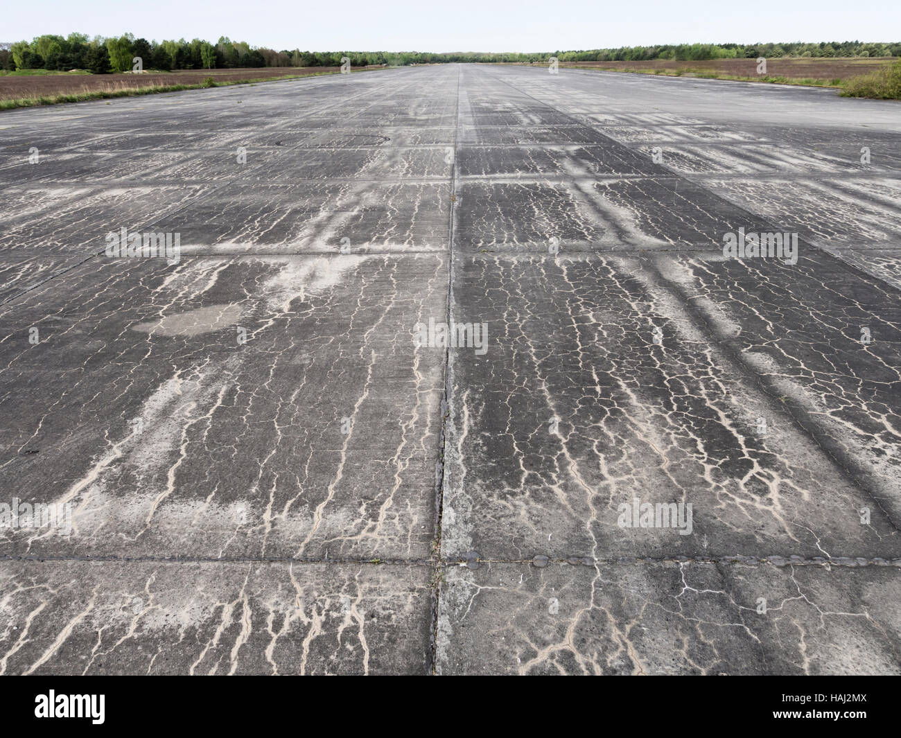 Abandoned concrete airport runway and airfield, fallow land Stock Photo ...