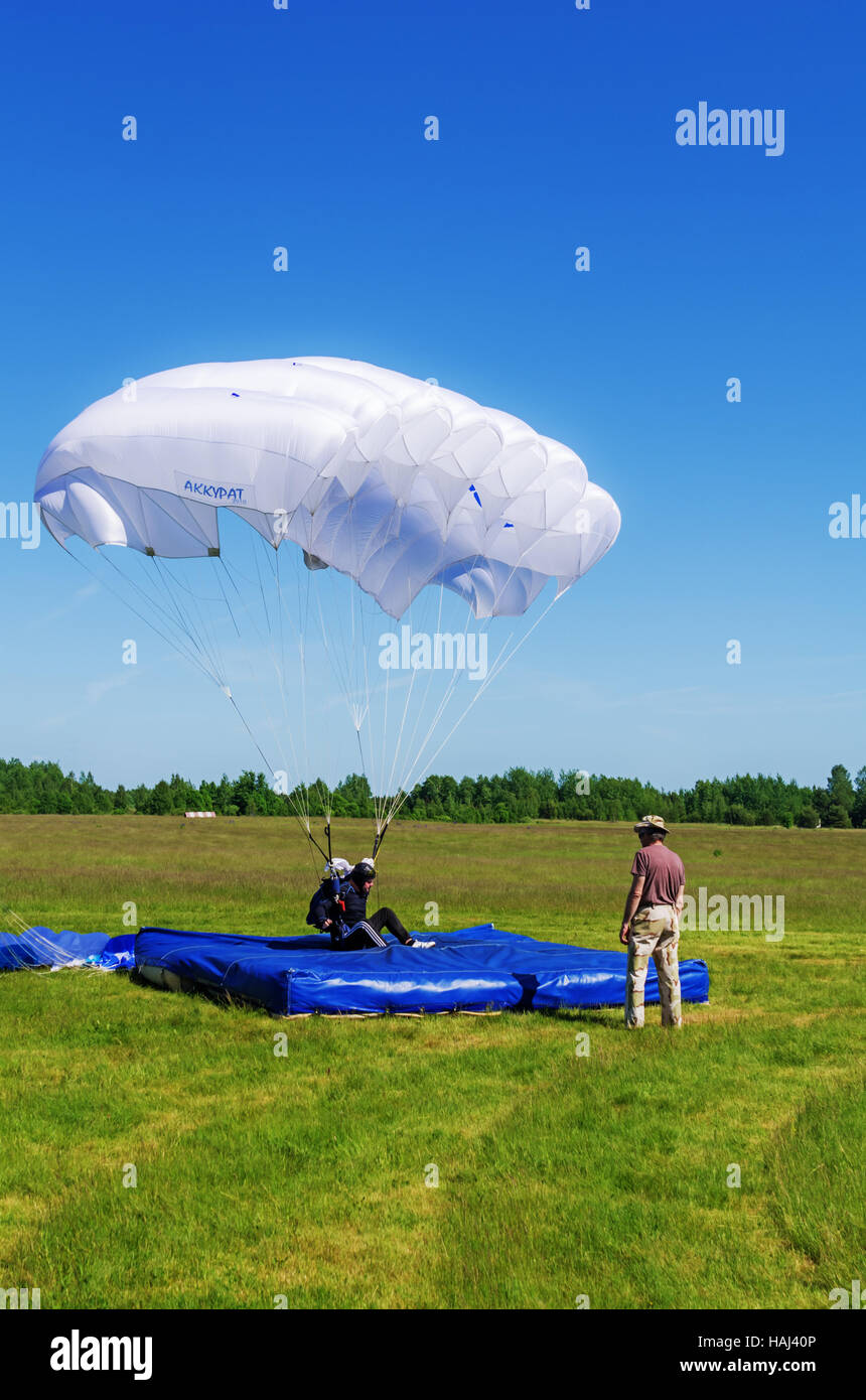 Parachutists - 2015.Landing on airfield Stock Photo - Alamy