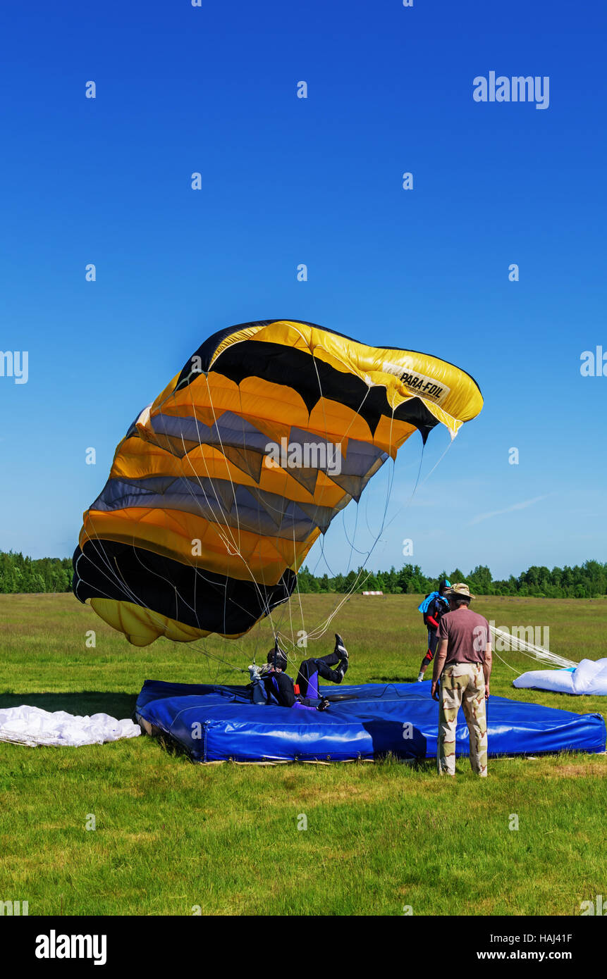 Parachutists - 2015.Landing on airfield Stock Photo - Alamy