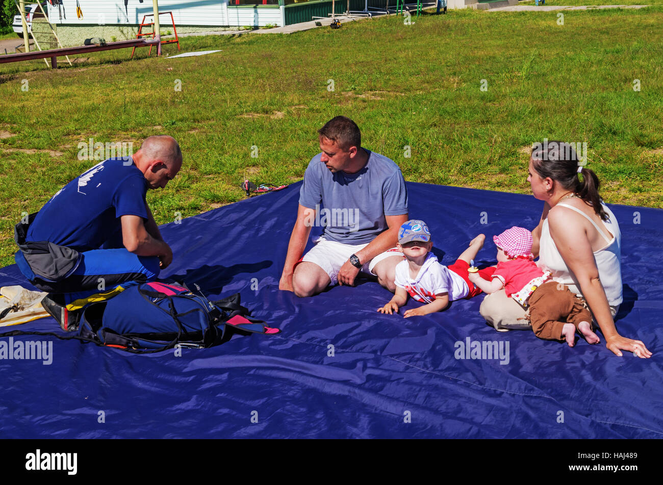 Parachutists - 2015.Skydivers and their child Stock Photo - Alamy