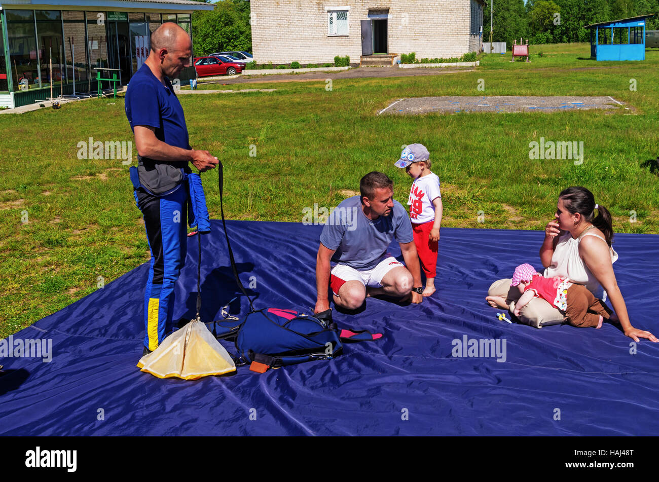 Parachutists - 2015.Skydivers and their child Stock Photo - Alamy