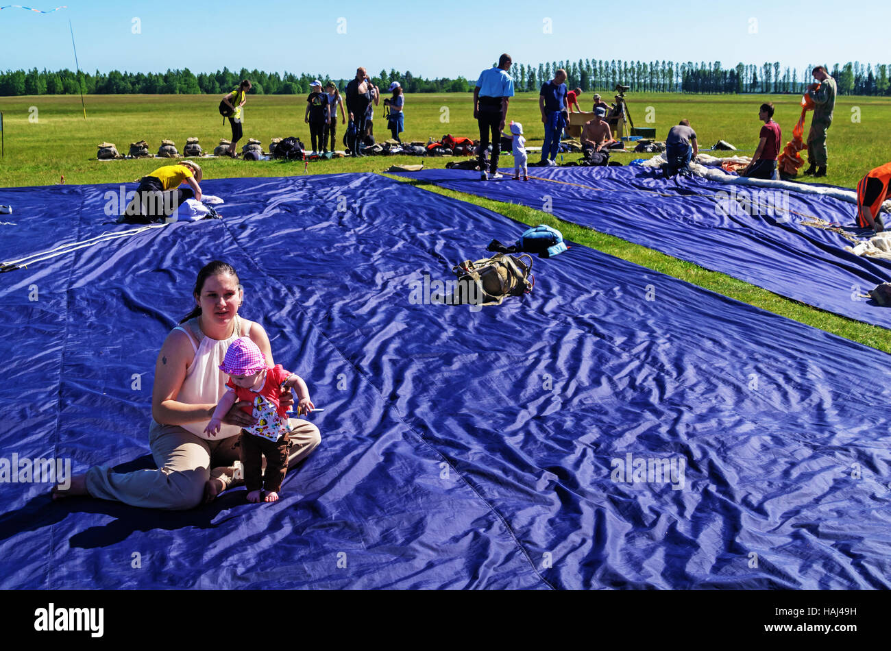 Parachutists - 2015.Skydivers and their child Stock Photo - Alamy