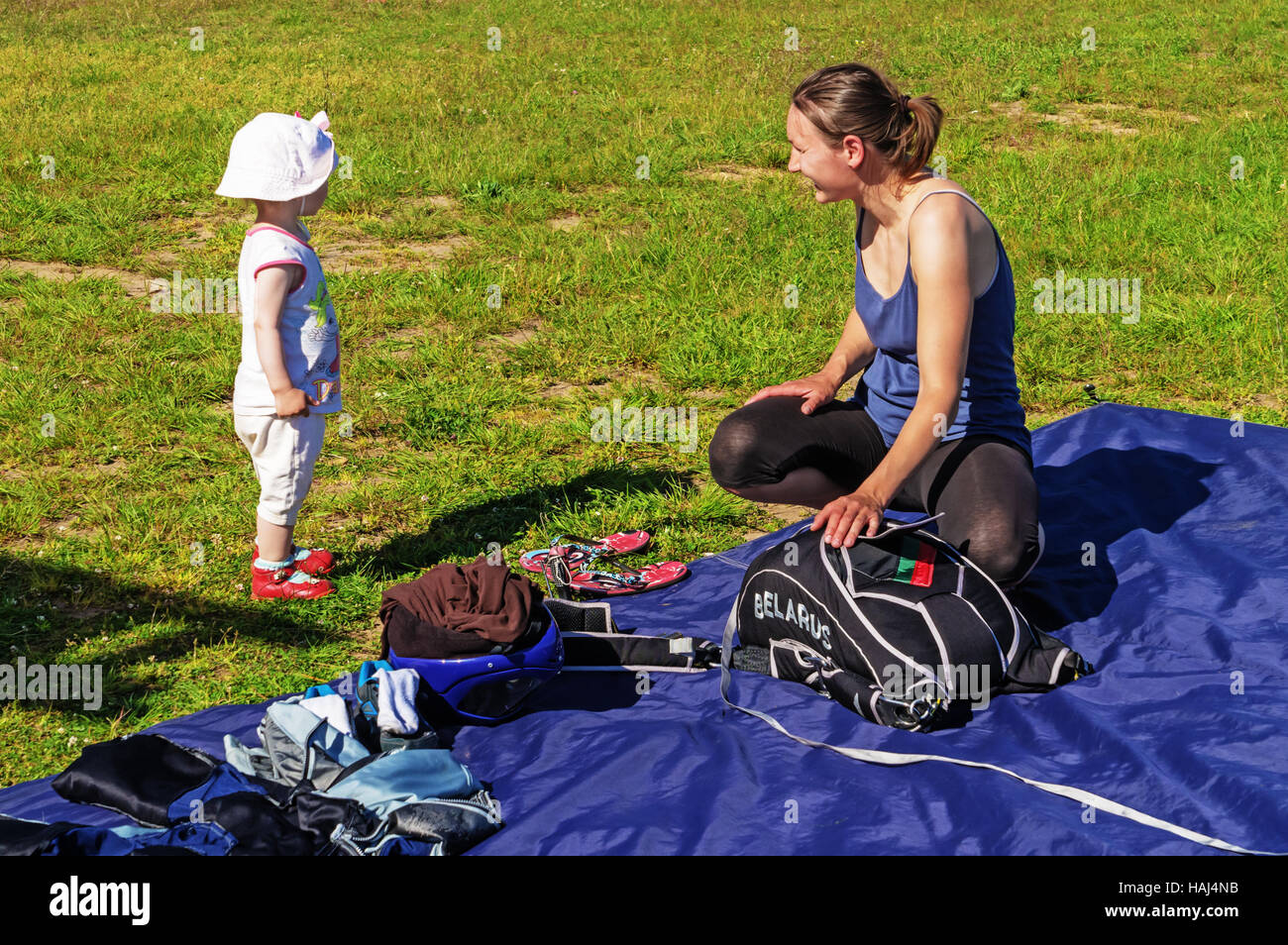 Parachutists - 2015.Skydivers and their child Stock Photo - Alamy