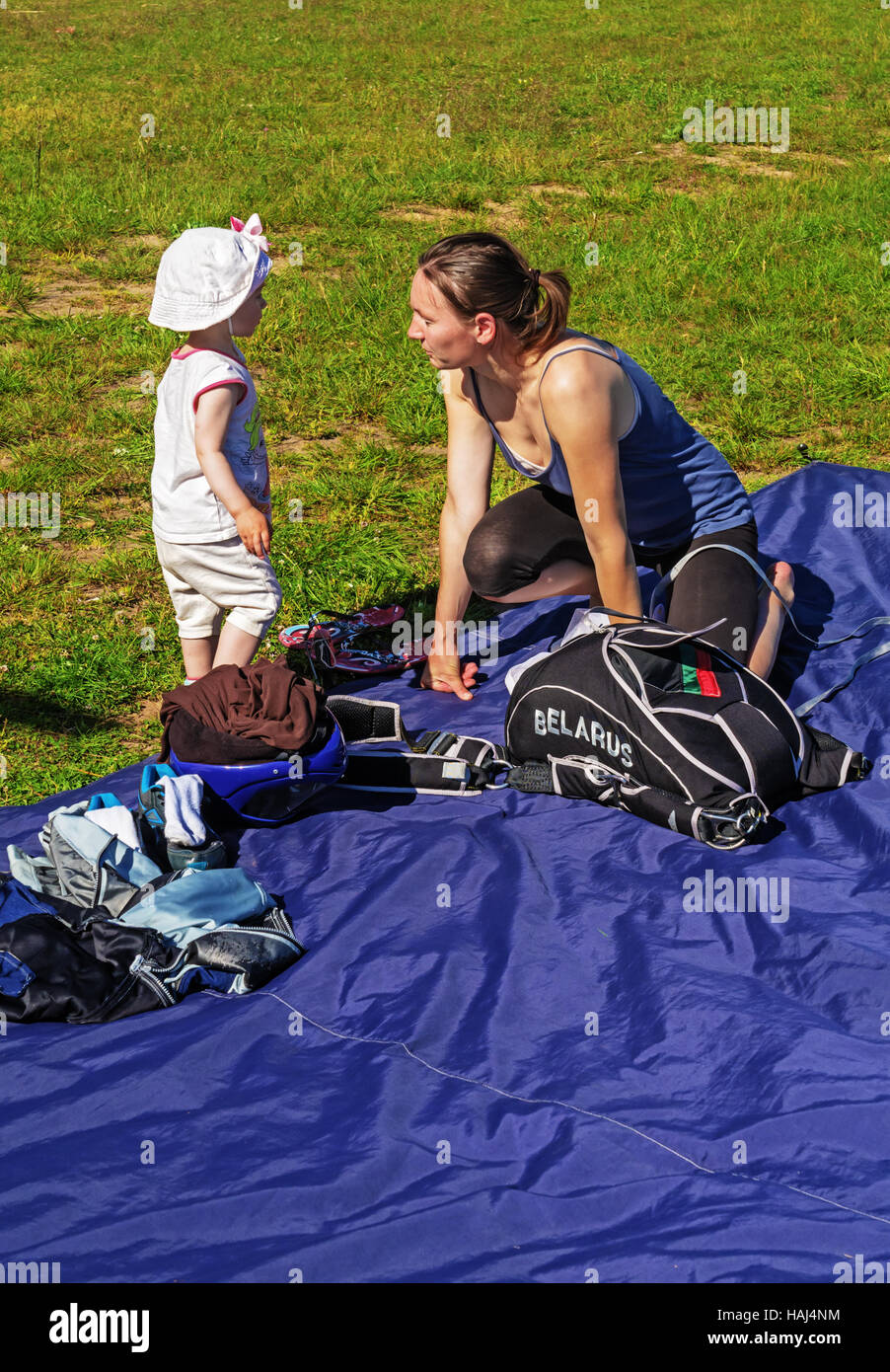 Parachutists - 2015.Skydivers and their child Stock Photo - Alamy