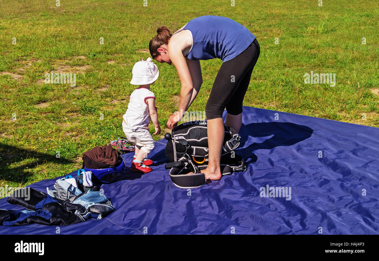 Parachutists - 2015.Skydivers and their child Stock Photo - Alamy