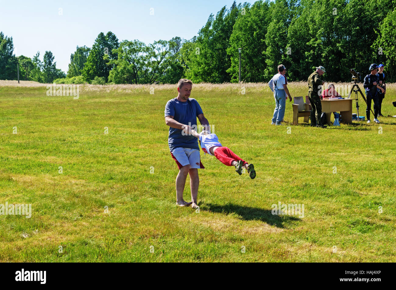 Parachutists - 2015.Skydivers and their child Stock Photo - Alamy