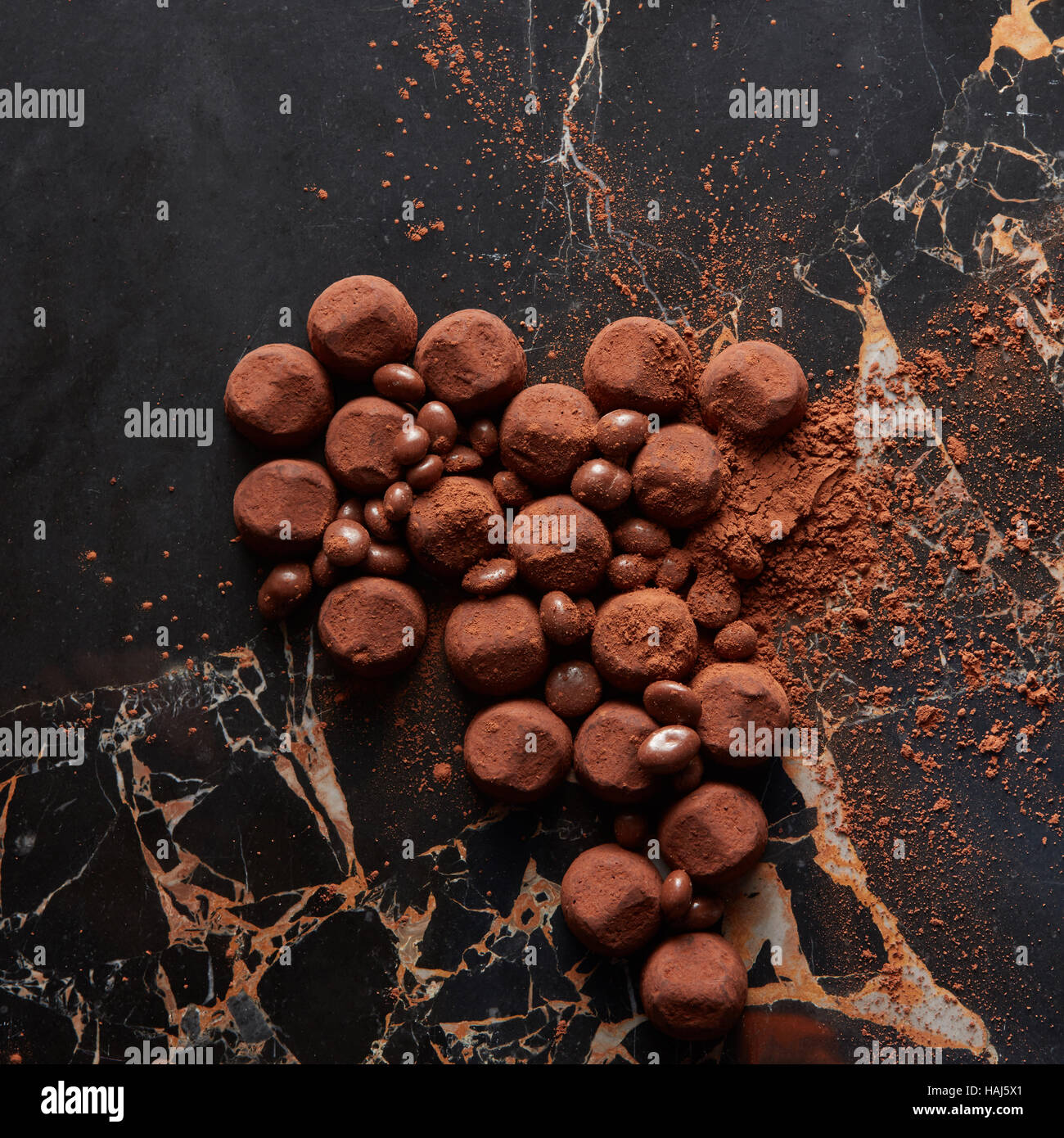 truffle candy on a dark marble background Stock Photo - Alamy