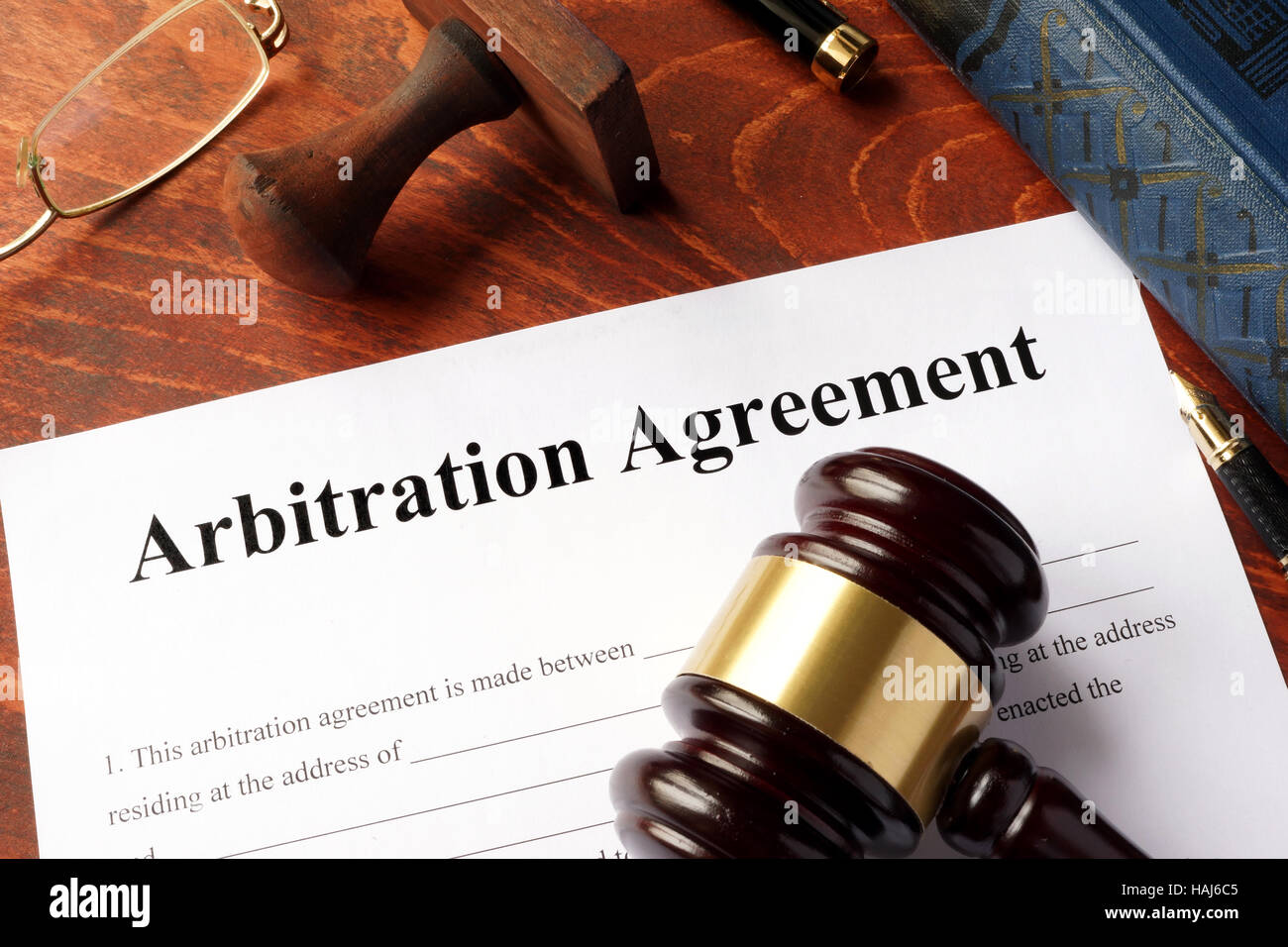 Arbitration agreement form on an office table Stock Photo - Alamy