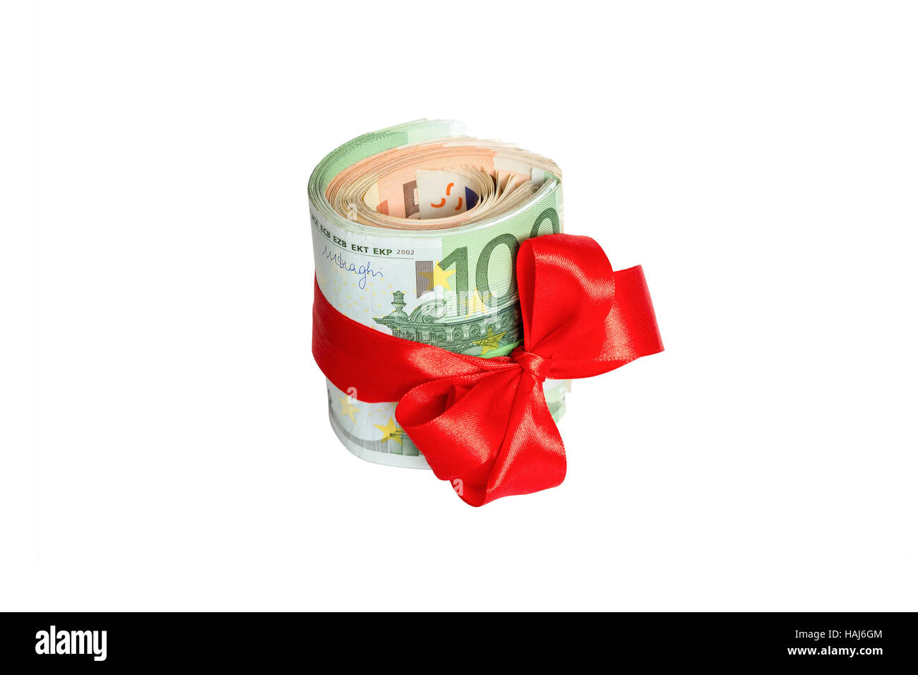 Christmas euro cash present with red bow Isolated on white background ...