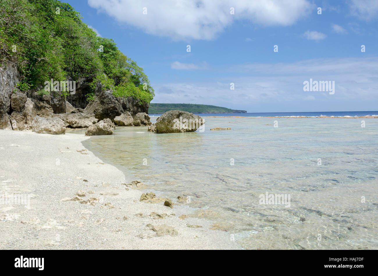 Sandy beach, rocks and coral reef, Pofitu, Niue, South Pacific, Oceania ...