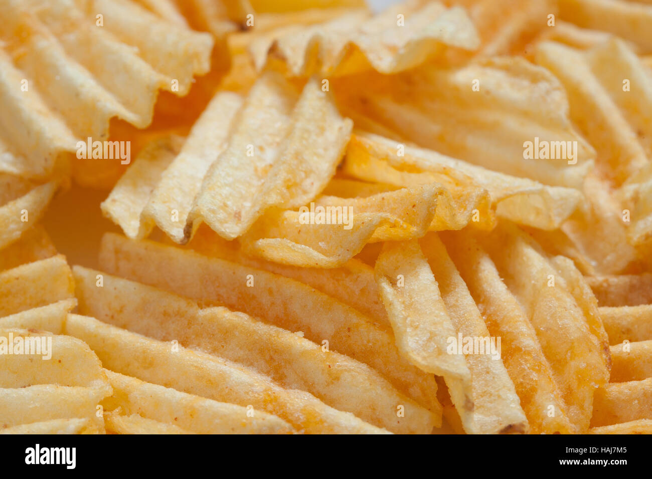 Potato chips background. Top view on a table Stock Photo - Alamy