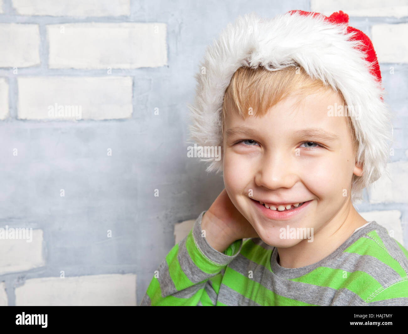 Little boy with Santa hat Stock Photo - Alamy