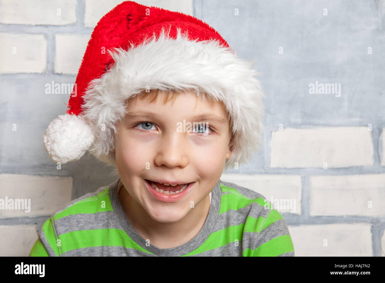 Little boy with Santa hat Stock Photo - Alamy