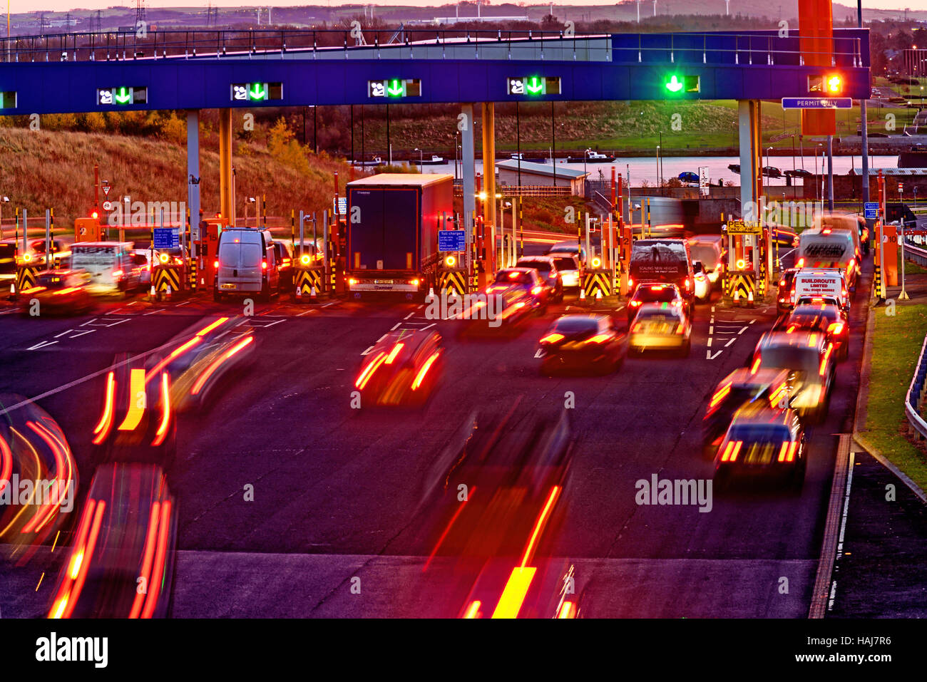 Tyne tunnel automatic non operator toll booths traffic at sunset Stock ...
