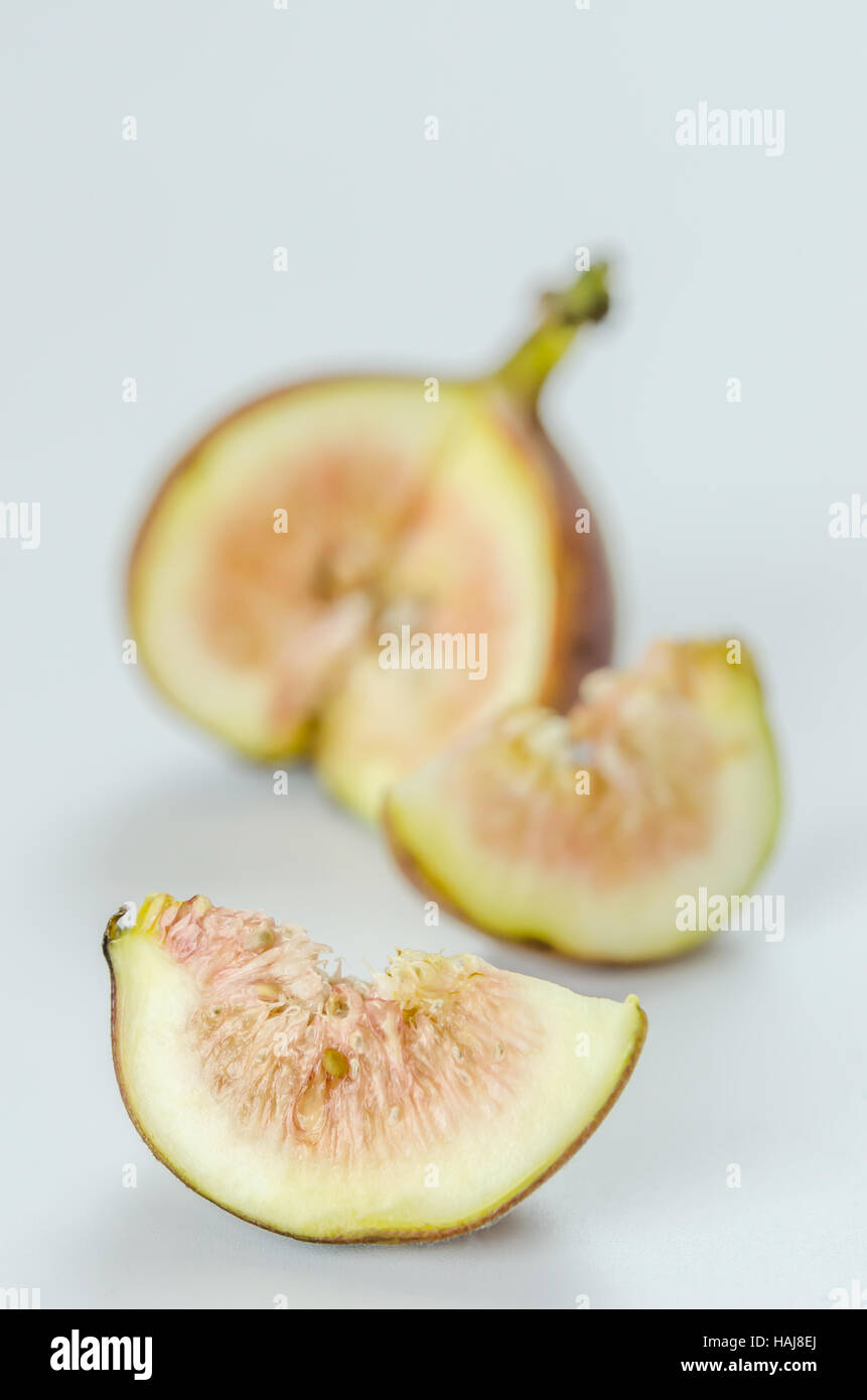 sliced fresh figs fruit on white background Stock Photo - Alamy