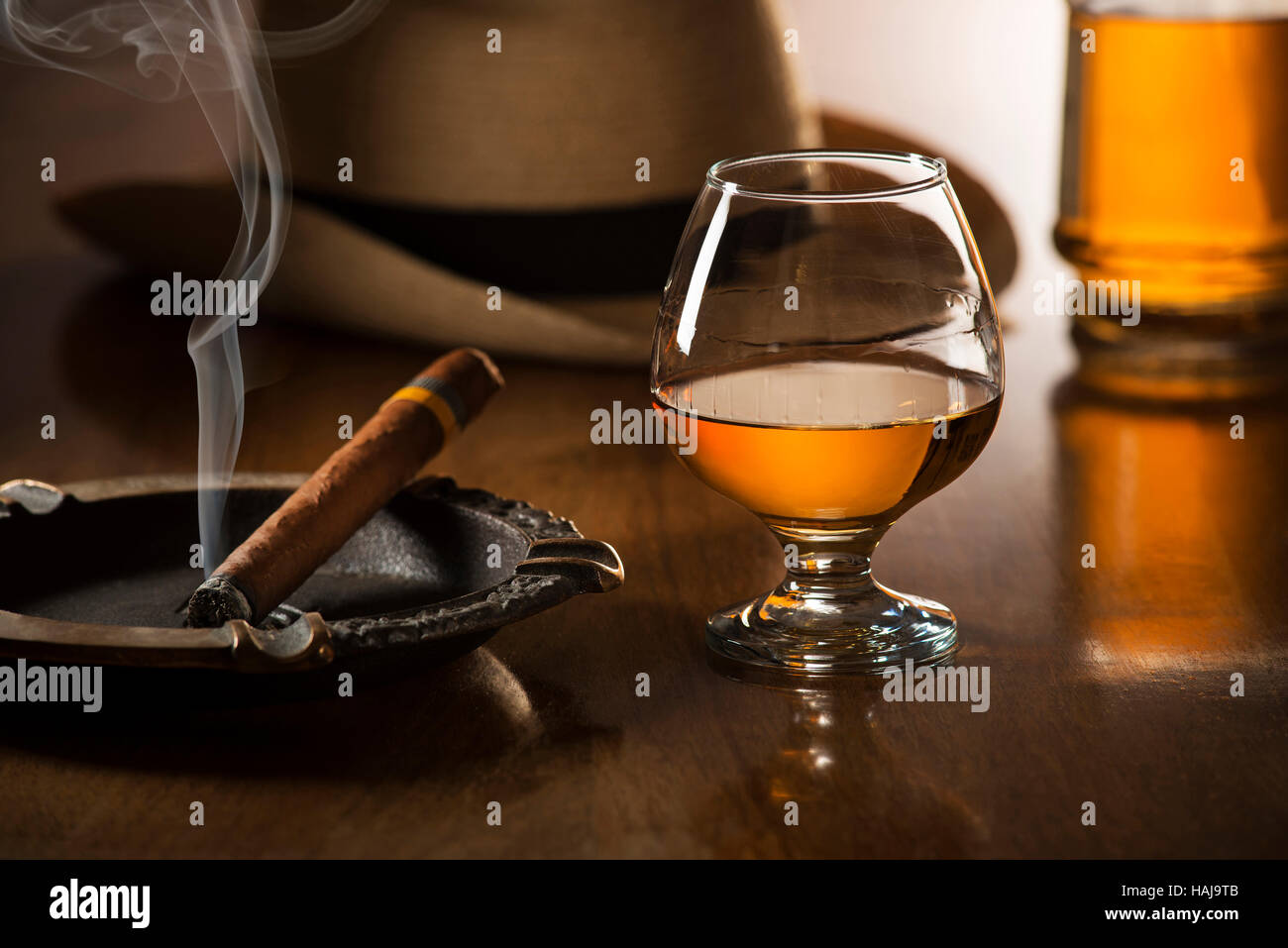 Cigar smoke hi-res stock photography and images - Alamy