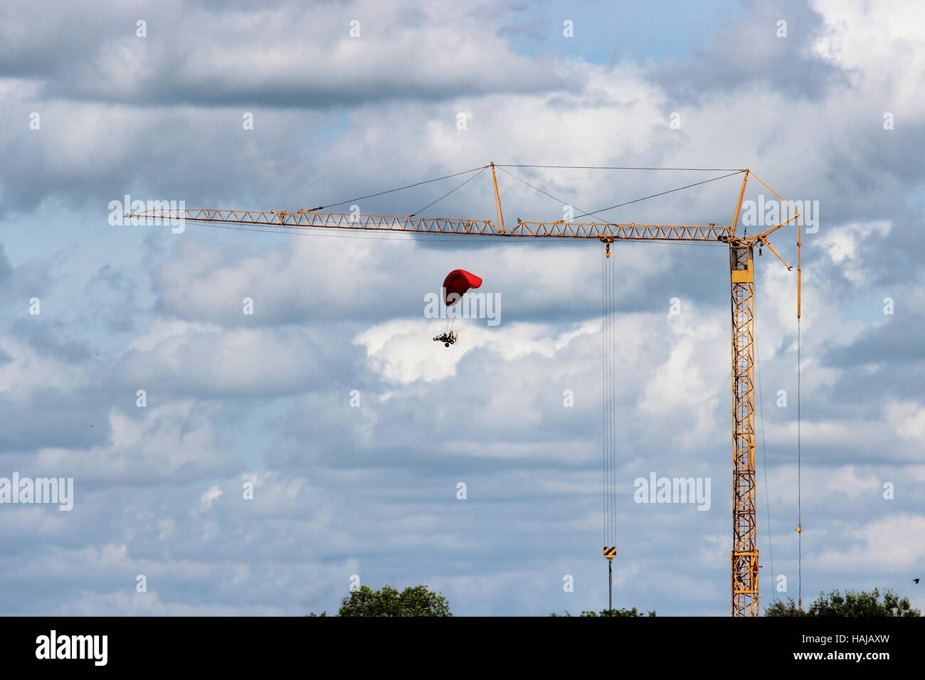 Flying around construction crane hi-res stock photography and images ...