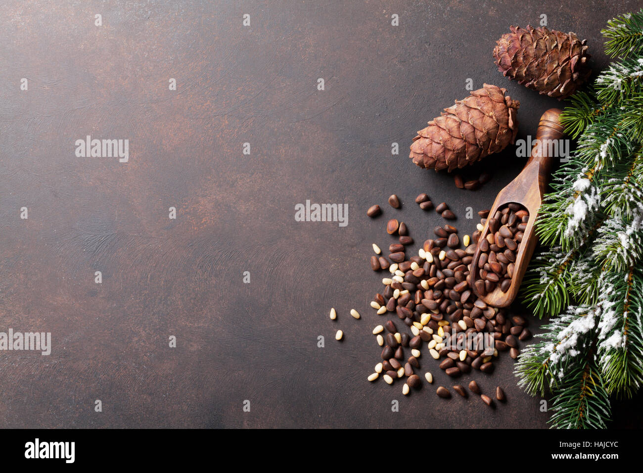 Pine nuts on stone table. Top view with copy space Stock Photo - Alamy