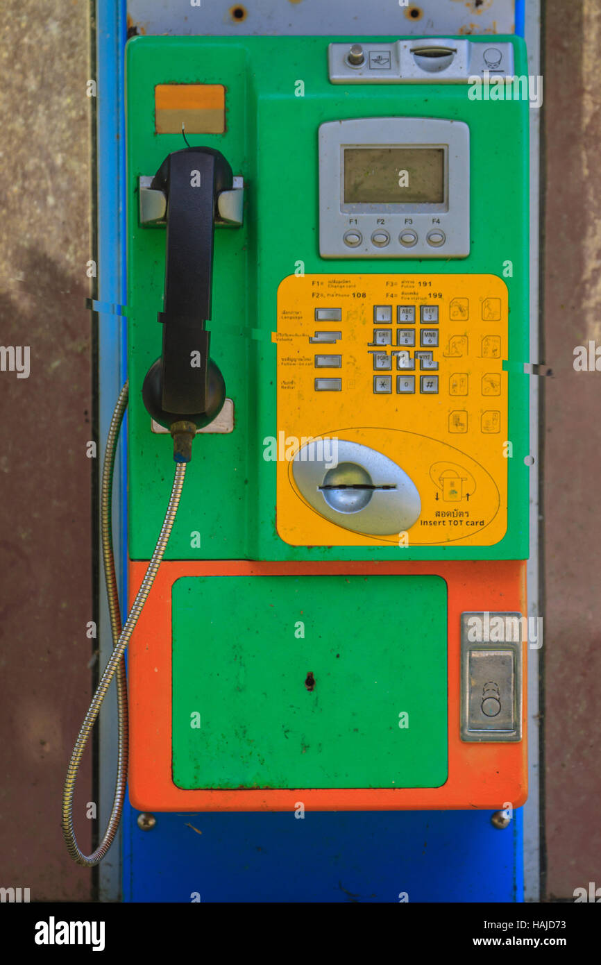 close up old public telephone coin in Thailand Stock Photo - Alamy
