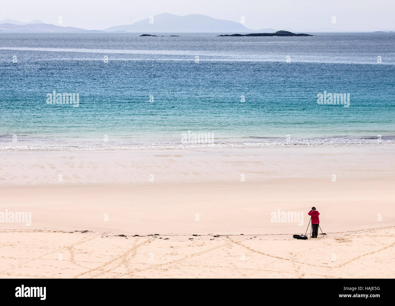A photographer on the Hushinish beach, Harris, Hebrides, Scotland Stock ...