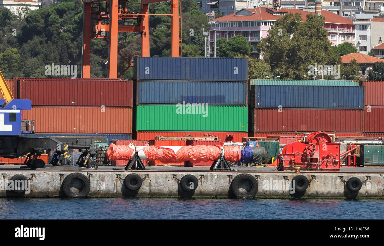 Containers waiting to transfer in a port Stock Photo - Alamy