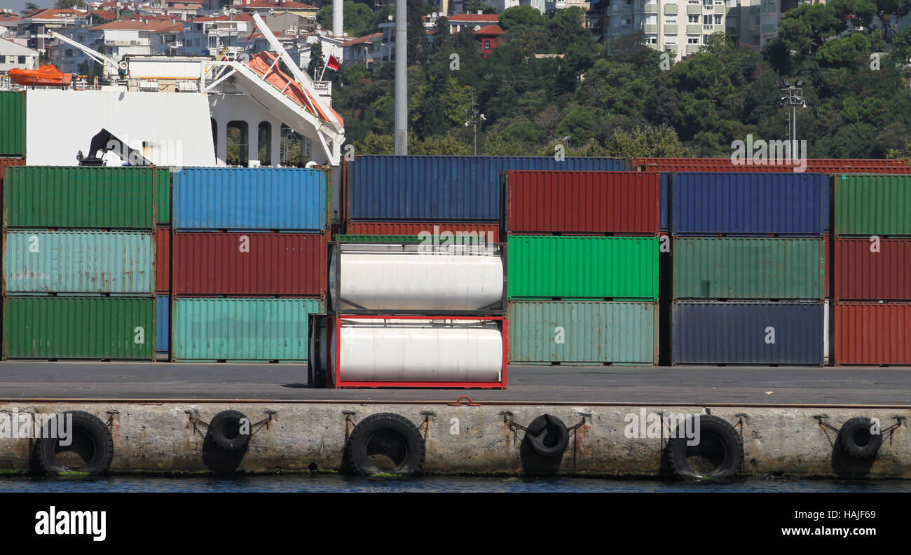 Containers waiting to transfer in a port Stock Photo - Alamy