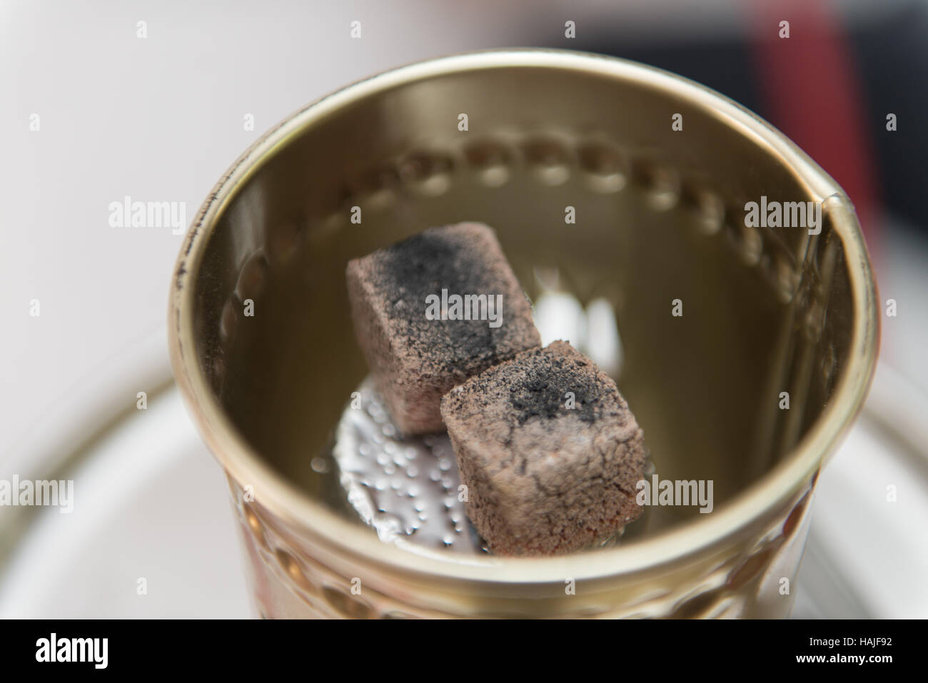 Preparation The Hookah With Charcoal For Smoking The Traditional Hubble ...