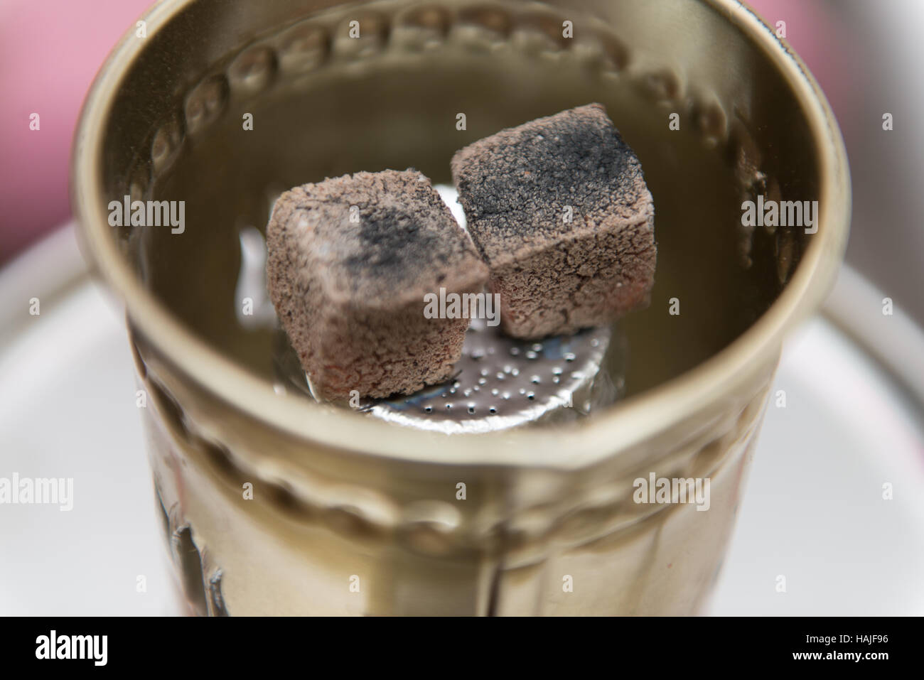 Preparation The Hookah With Charcoal For Smoking The Traditional Hubble ...