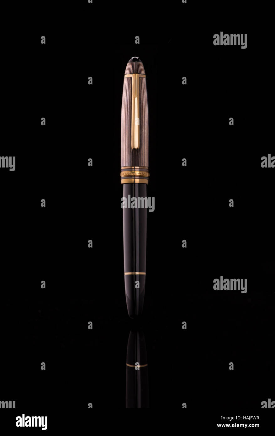 pen with reflection in black background Stock Photo - Alamy