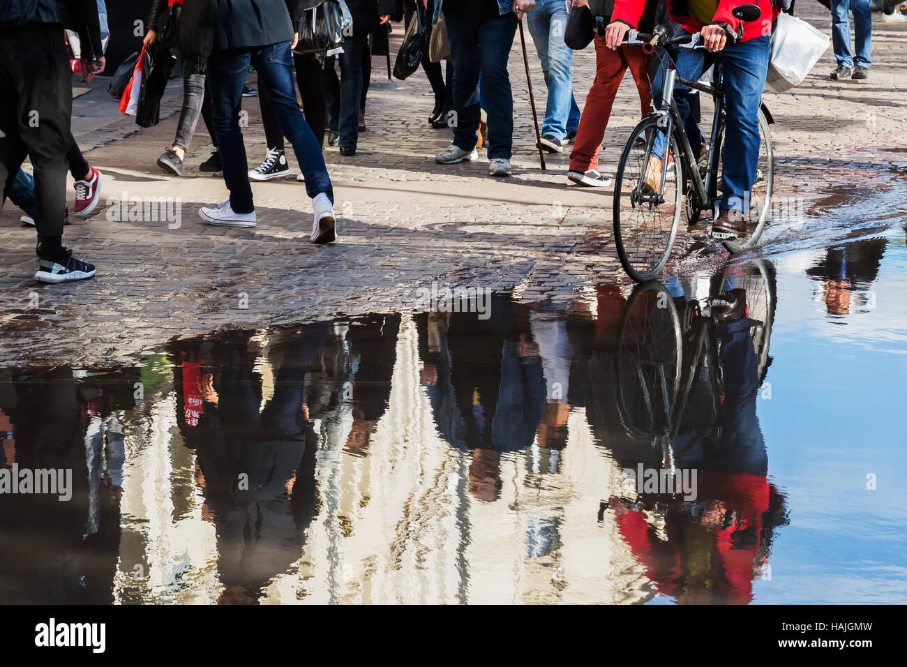 People walking in a puddle hi-res stock photography and images - Alamy