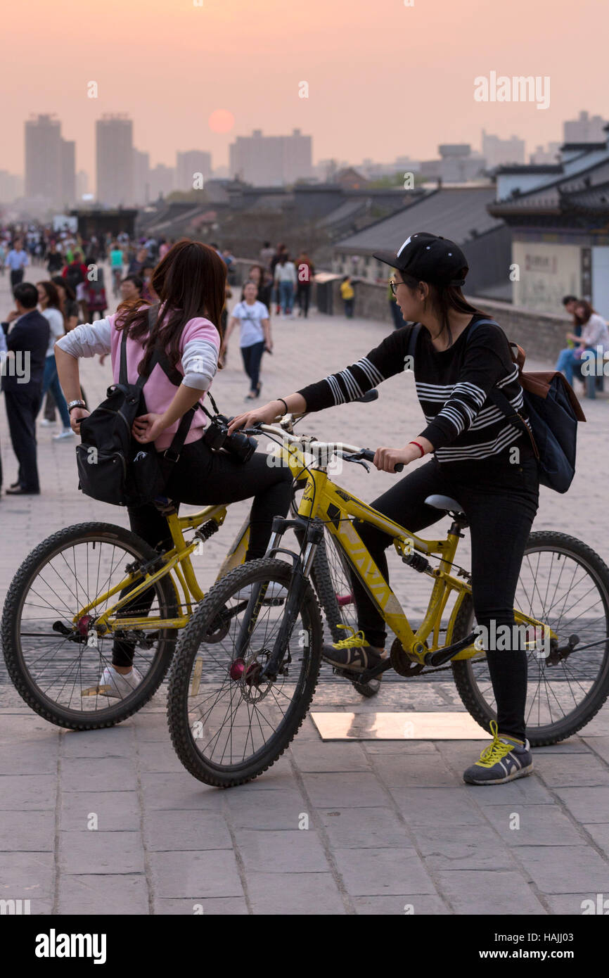 Chinese girl on bike hi-res stock photography and images - Alamy