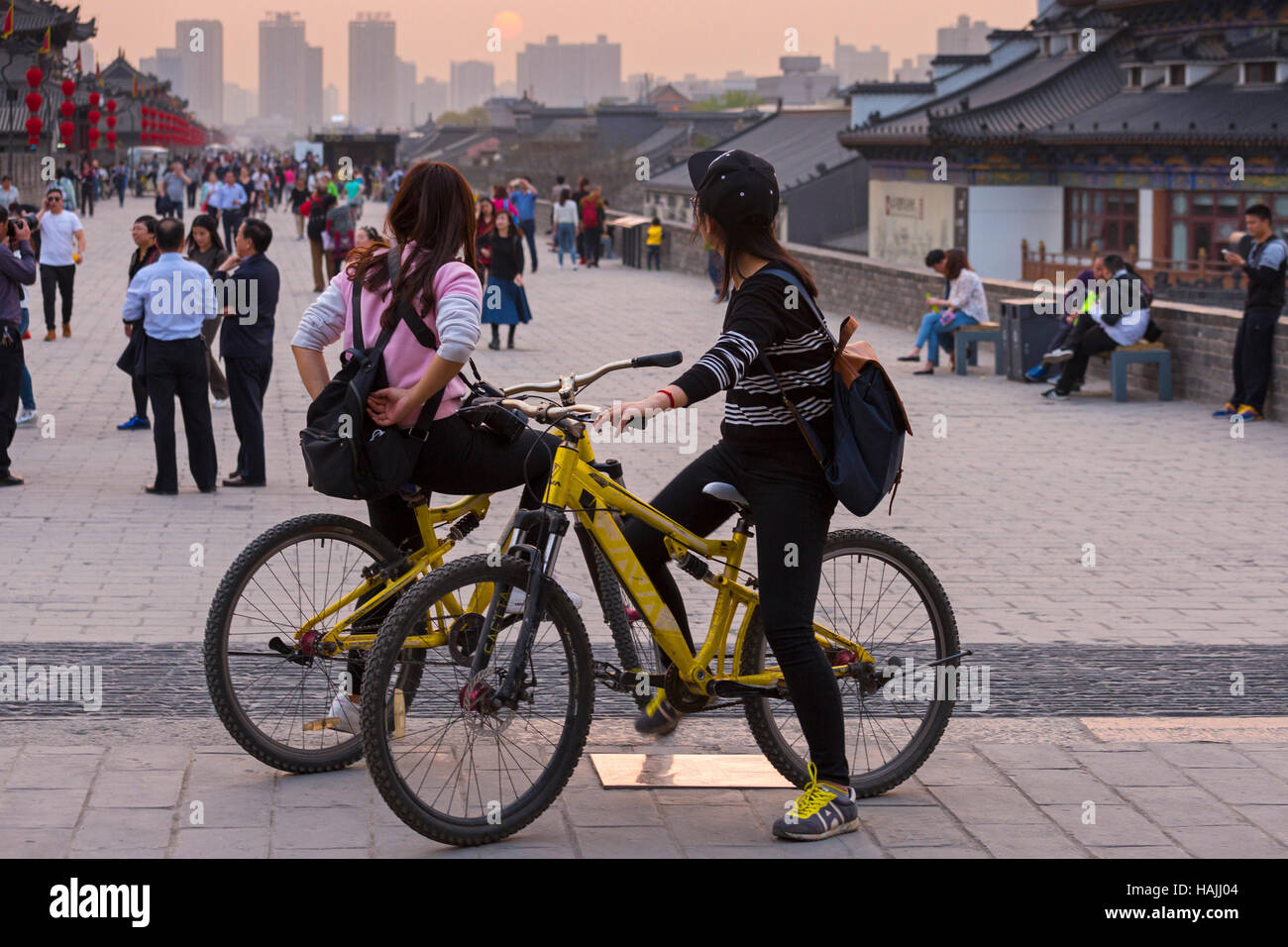 Chinese girl on bike hi-res stock photography and images - Alamy