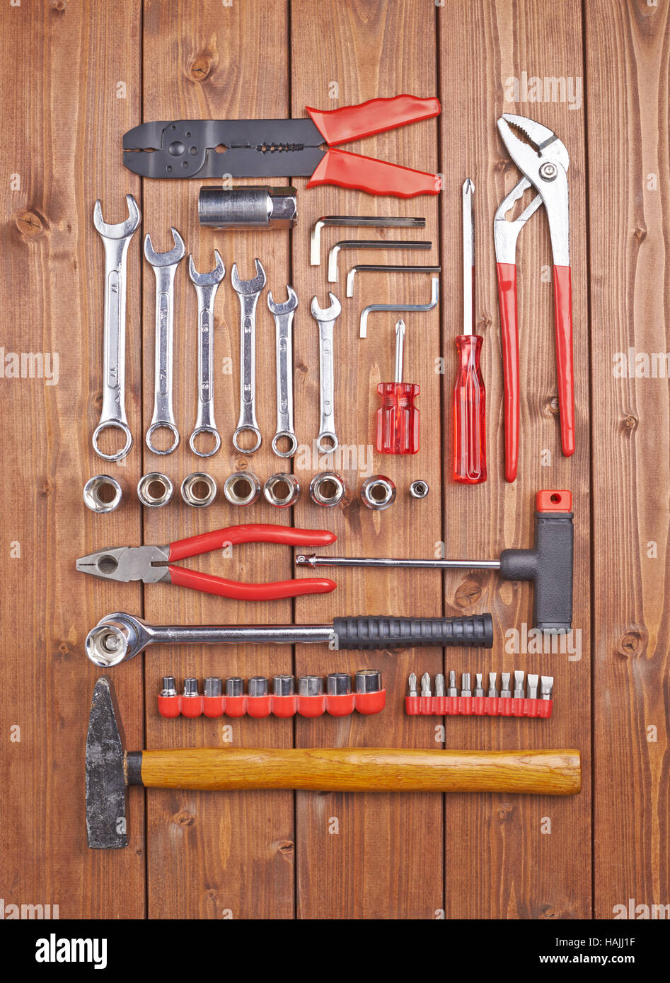 Set of different work tools on wooden surface Stock Photo - Alamy