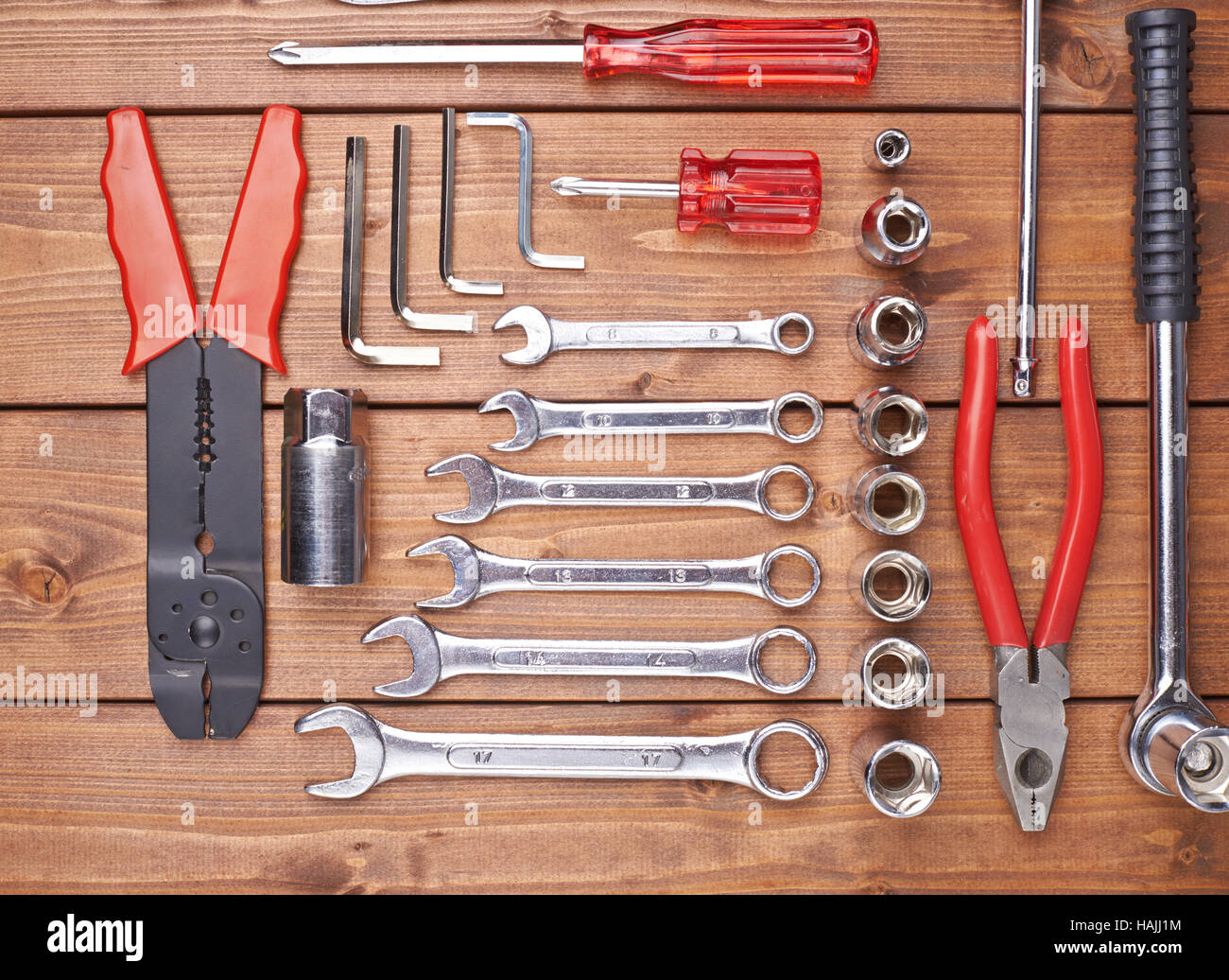 Set of different work tools on wooden surface Stock Photo - Alamy