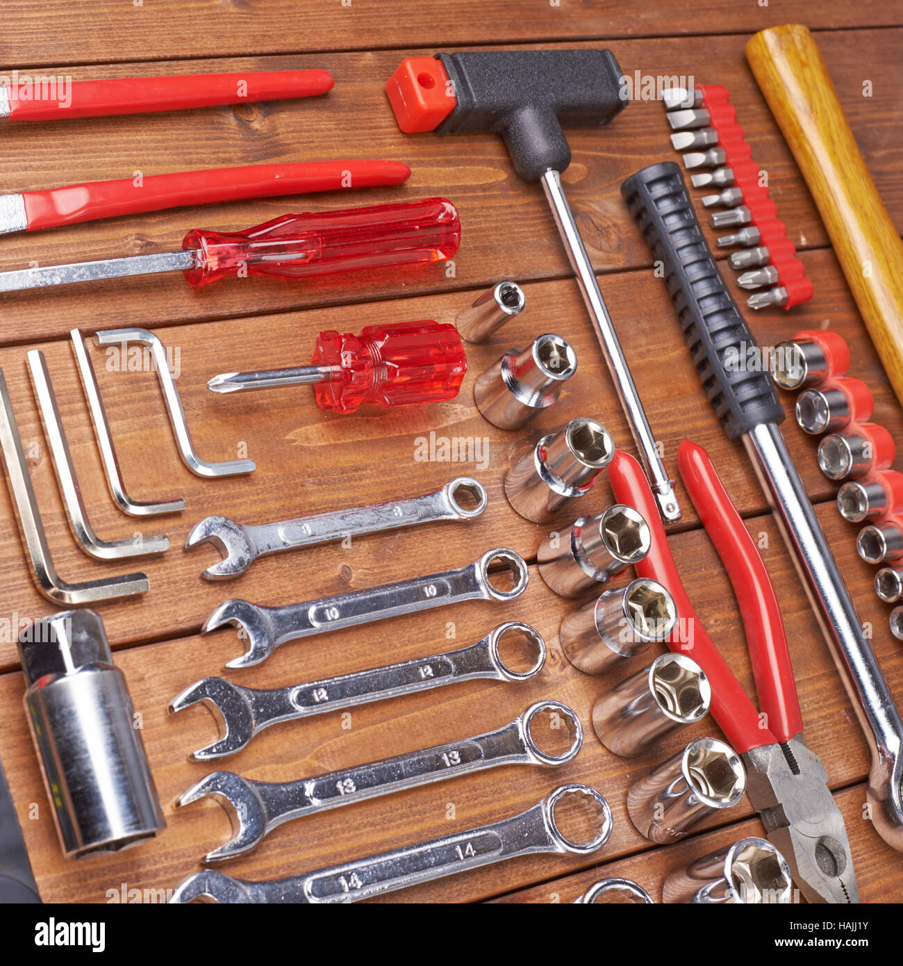 Set of different work tools on wooden surface Stock Photo - Alamy